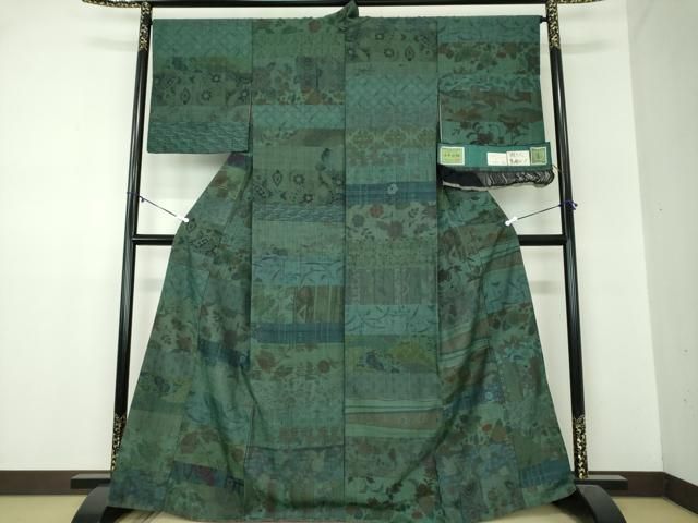 平和屋着物○小千谷紬 小千谷織物 百柄 横段花文 織り人・高橋シン作