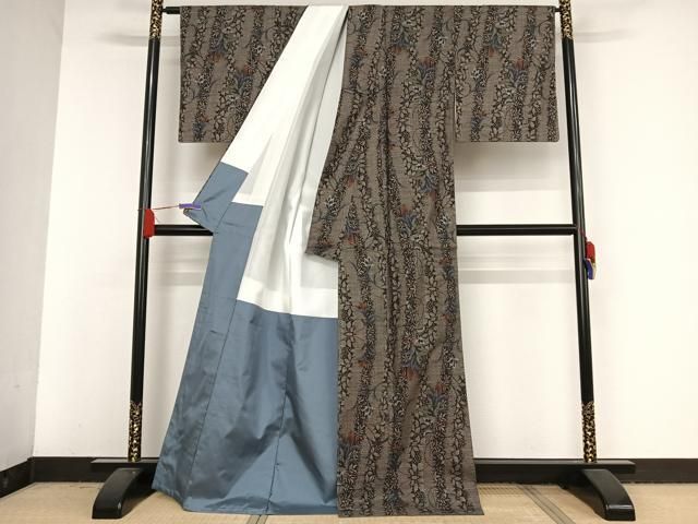 平和屋着物○本場大島紬 純泥染 手織 9マルキ 更紗花文 興紬商店謹製