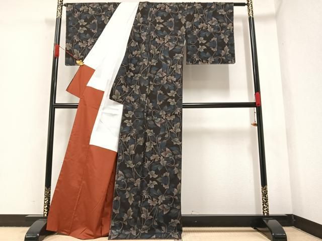 平和屋着物○本場大島紬 カタス9マルキ 地空 源氏車花文 黒地