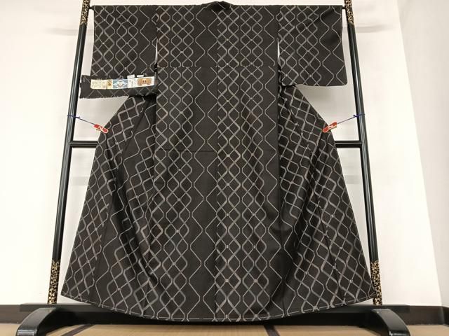 平和屋着物○本場大島紬 純泥染 手織 カタス7マルキ 草花文 当