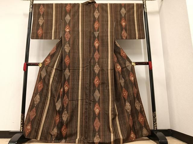 平和屋着物○伝統工芸士 七代目 吉澤与市 紬 絞り 切嵌