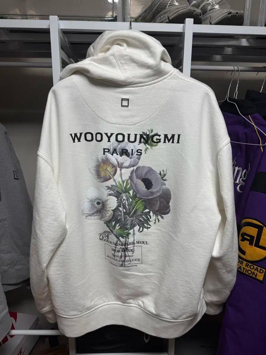 50 ／ 23ss WOOYOUNGMI(ウーヨンミ) フラワー フード付きTシャツ - メルカリ