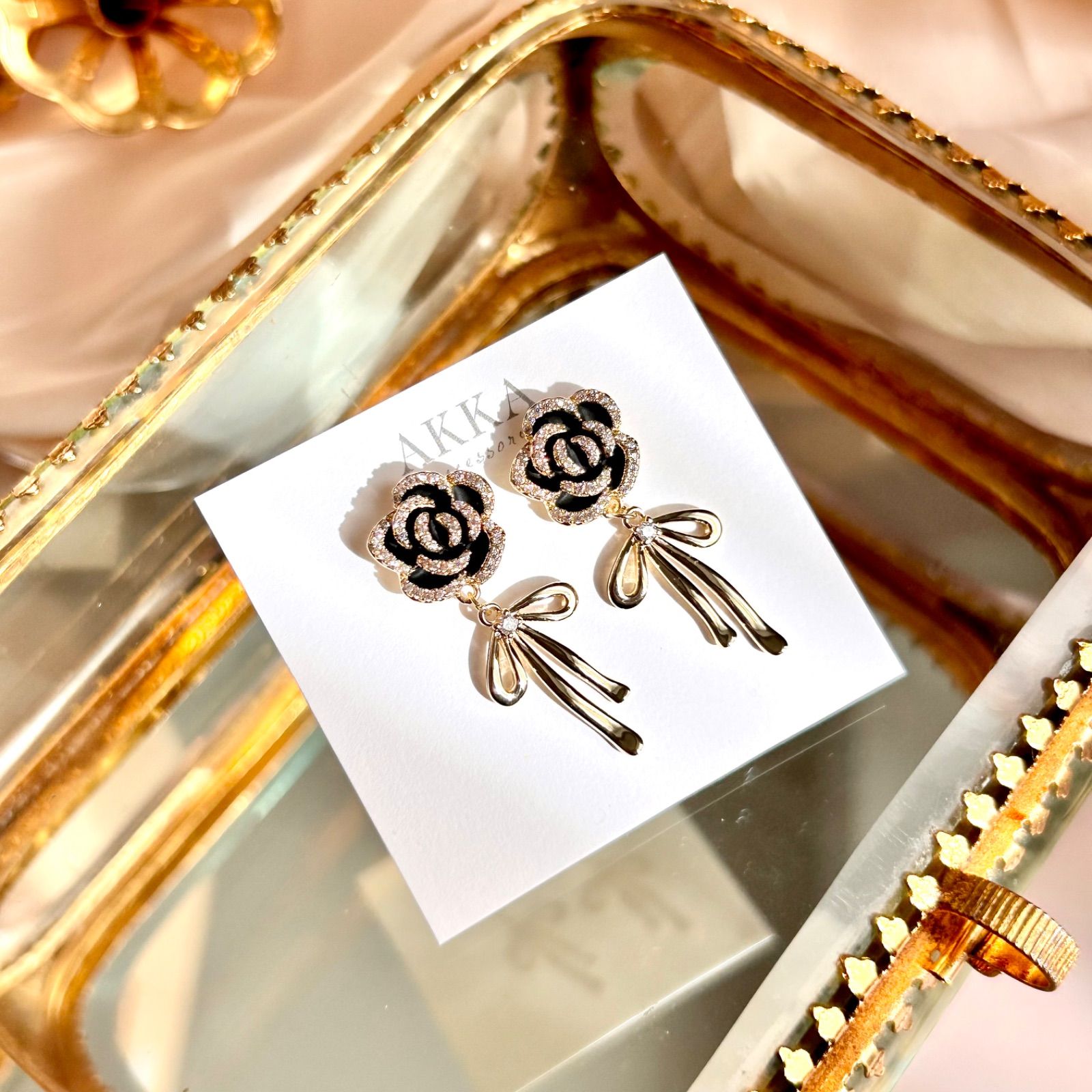 Flower&ribbon bijou earring zircon フラワーとリボンのビジュー樹脂イヤリング 大ぶりCZダイヤ樹脂ピアス ...