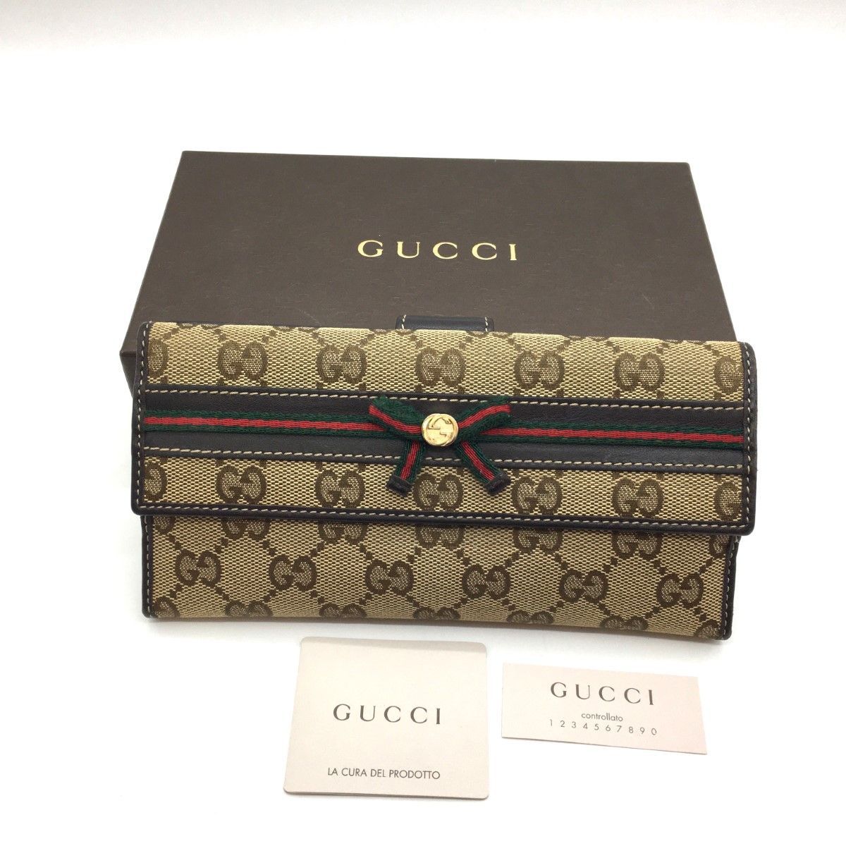 GUCCI グッチ GGキャンバス 2つ折 長財布 Wホック リボン レザー キャンバス 256933 2067 - メルカリ