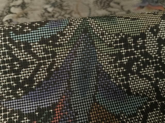 平和屋着物○本場大島紬 純泥染 手織 9マルキ 更紗花文 興紬商店謹製